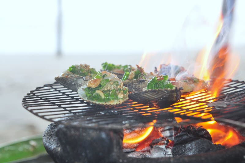 Grilling Shellfish and Seafood on Hot Fire Stock Photo - Image of ocean ...