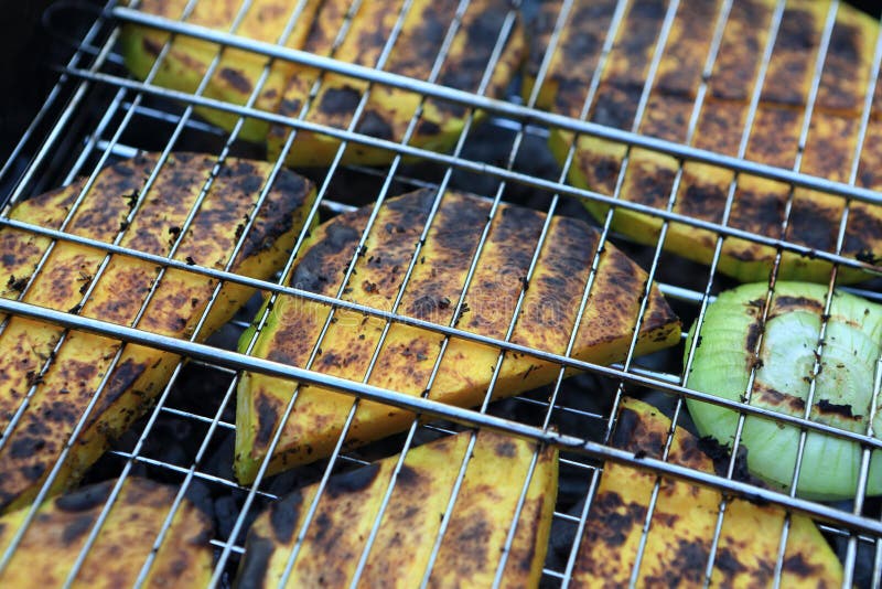 Grilling slices of pumpkin stock image. Image of eating - 60507743