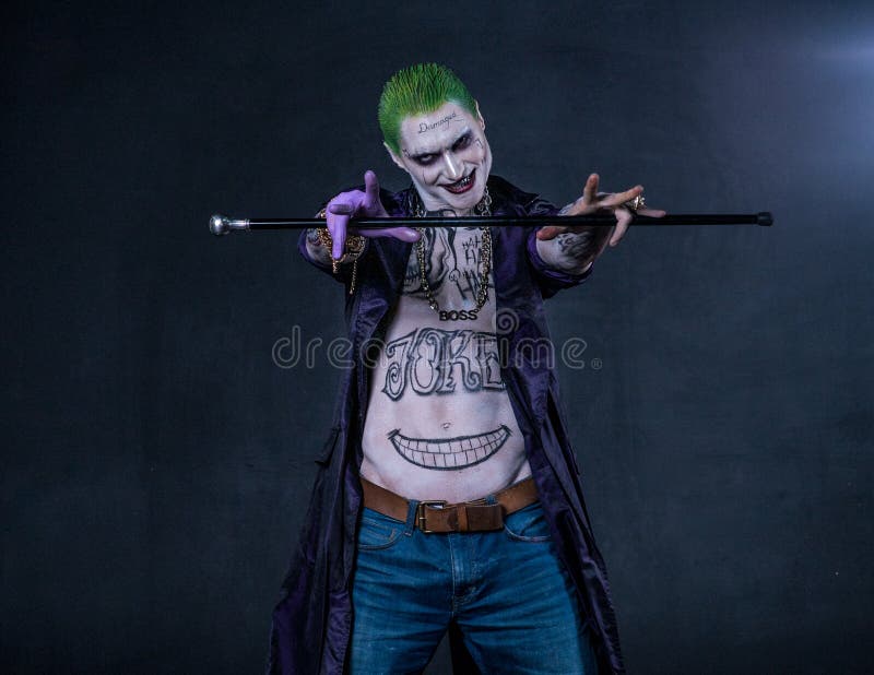 Grim Evil Character with Drawings on the Body Keeps the Stick. Green ...