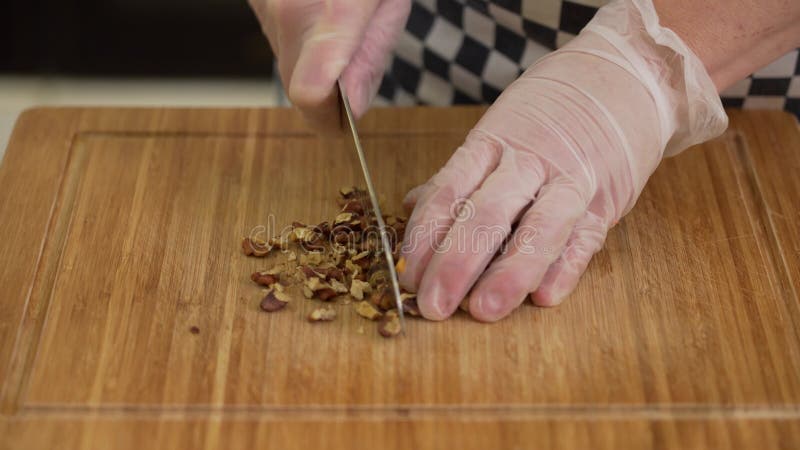 Grinding Almonds with a Big Kitchen Knife Stock Video - Video of grind ...