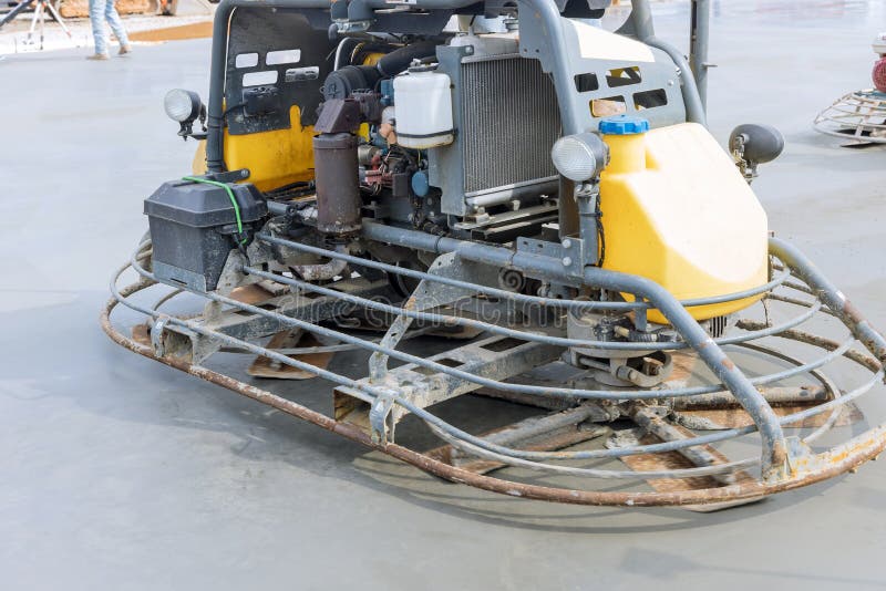 The Plasterer Polishing Concrete Foundation Floor with Grinding Cement ...