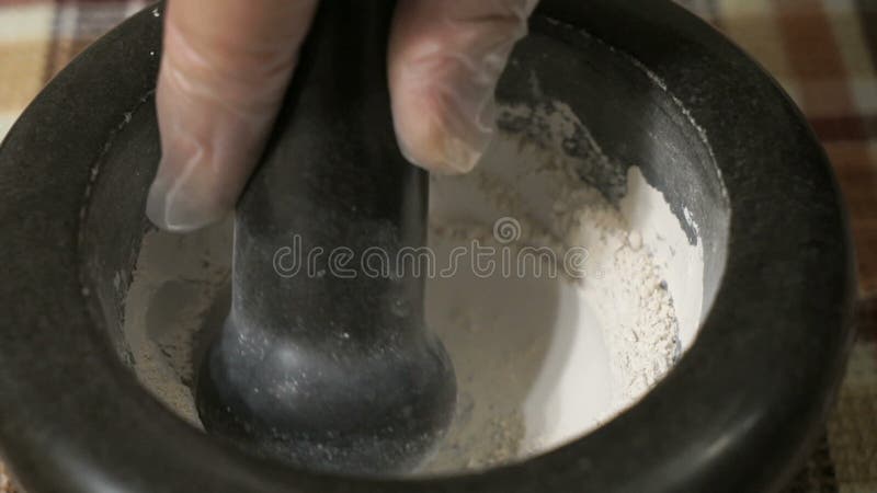 The Grinding of the Eggshell Using Mortar Stock Footage - Video of ...