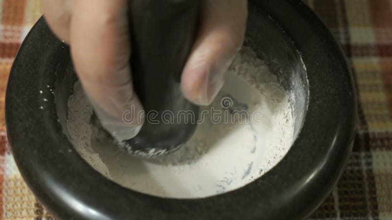 The Grinding of the Eggshell Using Mortar Stock Footage - Video of ...