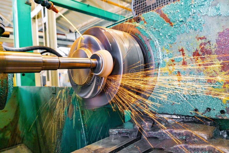 Grinding the End of the Abrasive Wheel with Sparks on a Circular ...