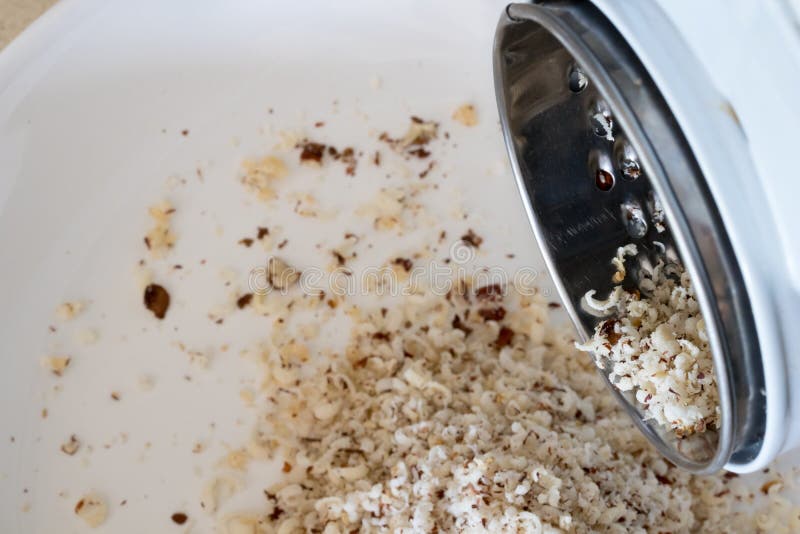 Grinding Hazelnuts in a Nut Mill before Baking a Cake Stock Image ...