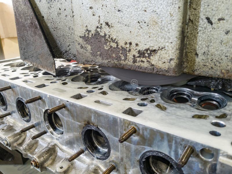 Grinding the Head of a Six-cylinder Engine on a Surface Grinder Stock ...