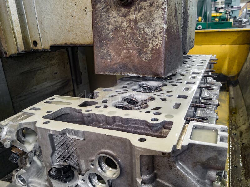 Grinding the Head of a Six-cylinder Engine on a Surface Grinder Stock ...