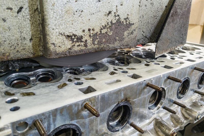 Grinding the Head of a Six-cylinder Engine on a Surface Grinder Stock ...