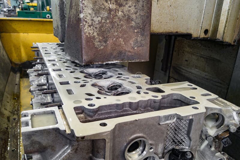 Grinding the Head of a Six-cylinder Engine on a Surface Grinder Stock ...