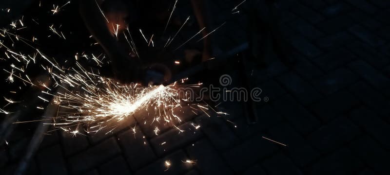 Grinding Machine Cut in Factory with Spark Stock Image - Image of light ...