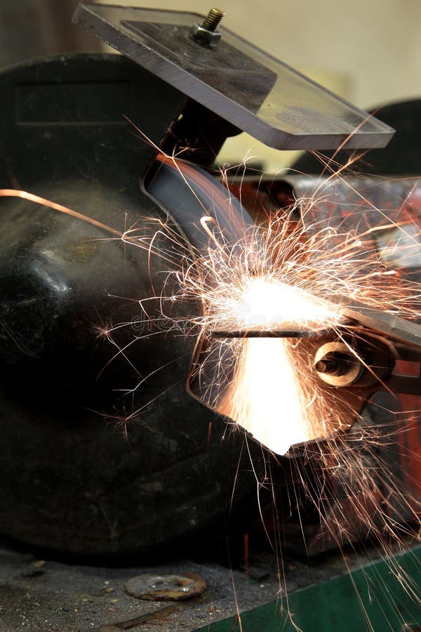 Grinding Metal with a Grinder in a Workshop Stock Photo - Image of ...