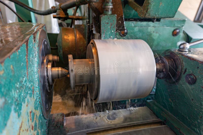 Grinding a Metal Part on a Circular Grinding Machine with Cooling Stock ...
