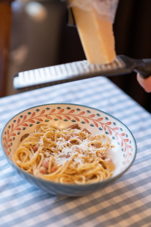 Grating Parmesan Cheese To Carbonara Stock Image - Image of grinder ...