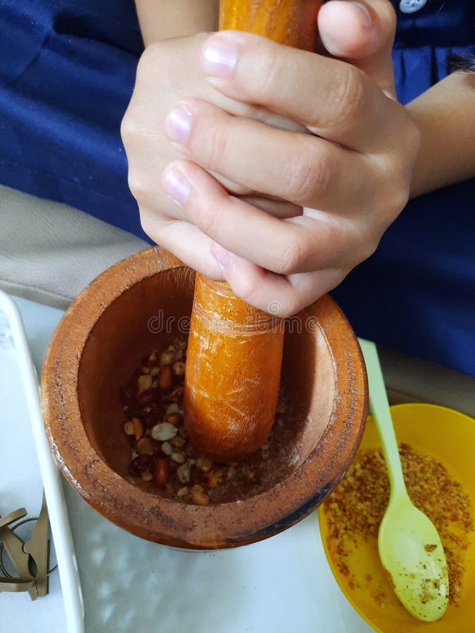 Grinding peanuts stock photo. Image of children, peanuts - 204559284