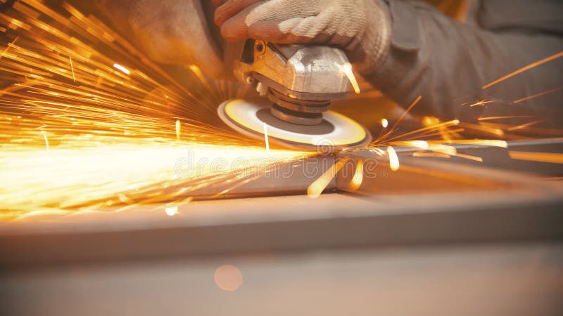 Grinding the Seams of an Iron Frame in the Welding Workshop - Bright ...