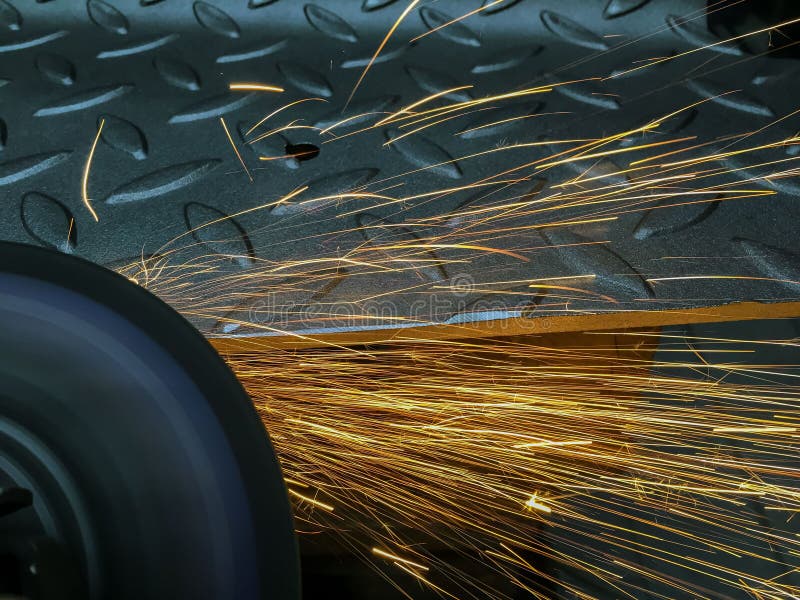 Grinding of Sharp Edges of Metal. Sparks. Stock Image - Image of ...