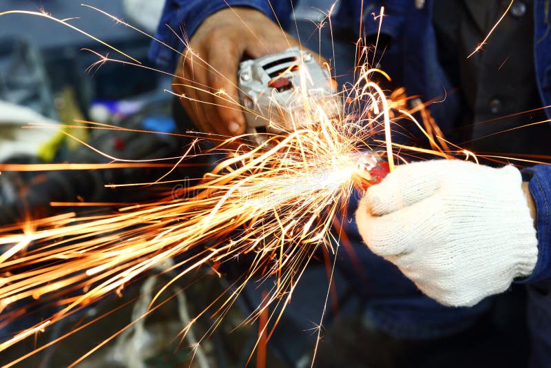 Man at work grinding steel stock image. Image of craft - 18204559