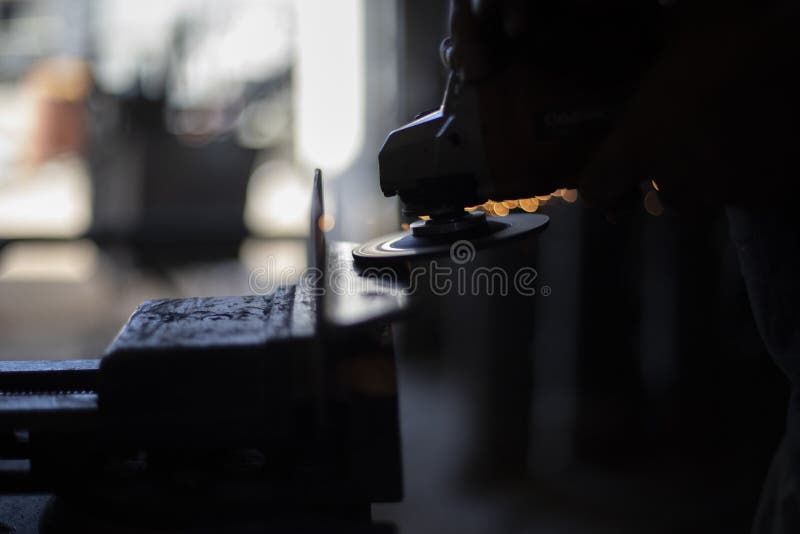 Grinding Steel. Worker Grinds Metal. Work in Garage Stock Image - Image ...