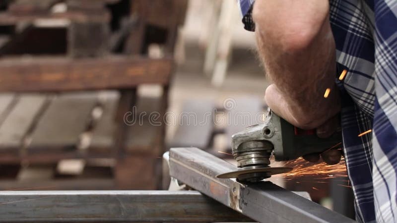 Grinding a Weld on Metal Structures with a Grinder, Work of a Master on ...