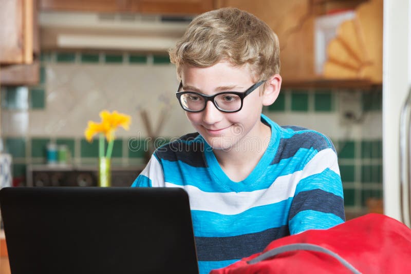 Grinning Child Using Laptop Computer Stock Image - Image of knapsack ...