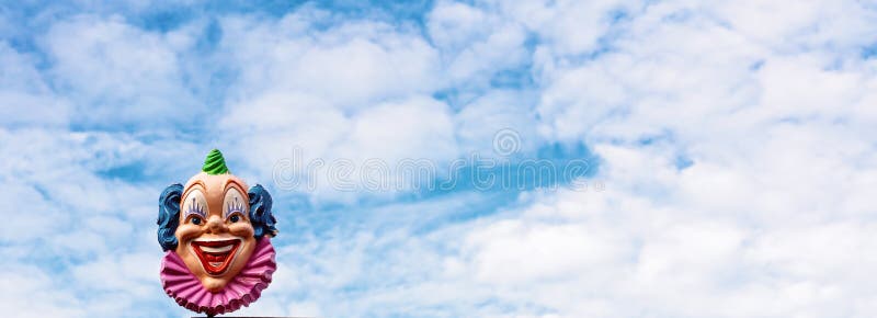 Grinning Clown Object Against Sky Background Stock Photo - Image of ...