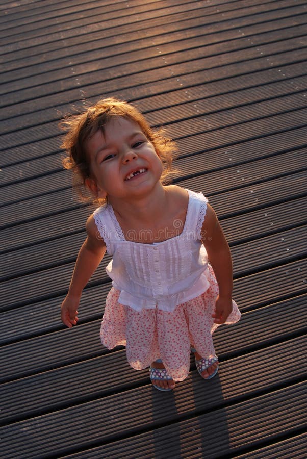 Grinning cute girl stock photo. Image of adorable, little - 3075312