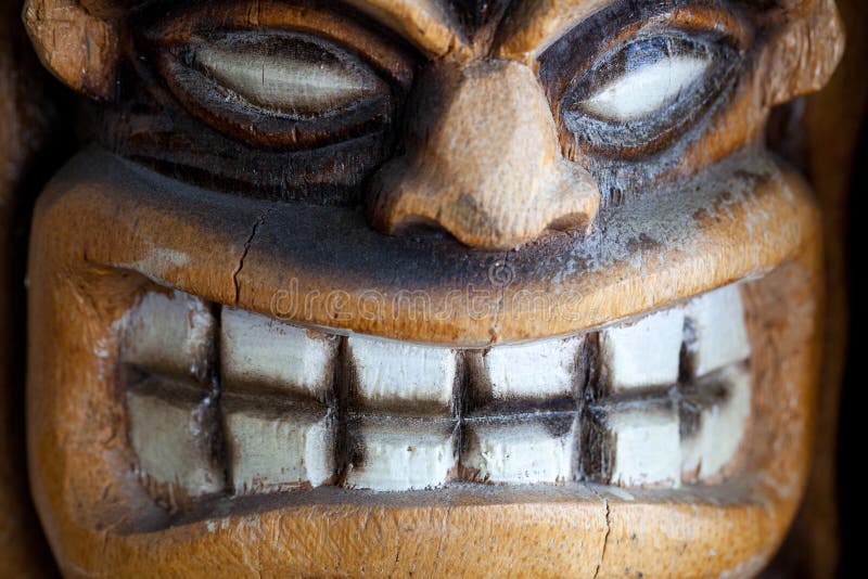 Grinning tiki stock photo. Image of hawaii, smiling, carved - 34000530