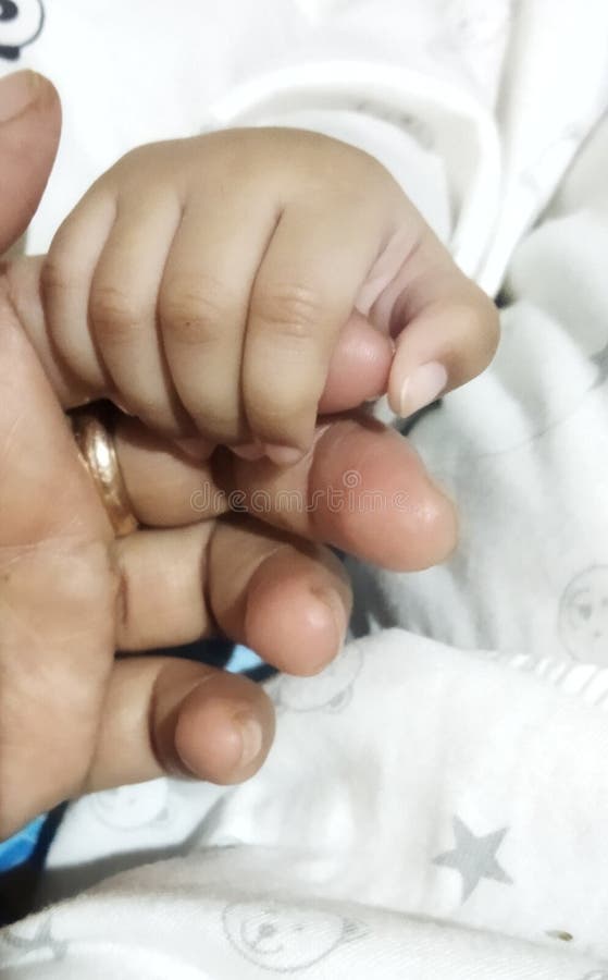 The Grip of a Child Hand and His Mother& X27;s Stock Image - Image of ...