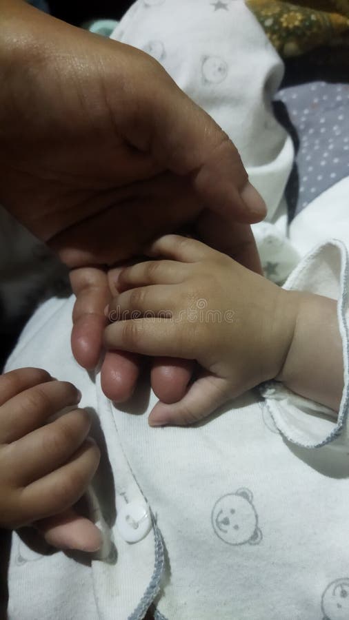 The Grip of a Child Hand and His Mother& X27;s Stock Image - Image of ...