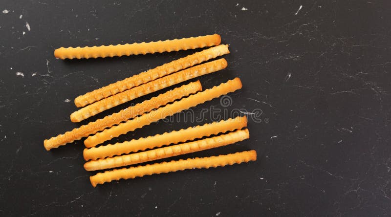 Grissini, Also Known As Breadsticks on Black Marble Like Table, View ...