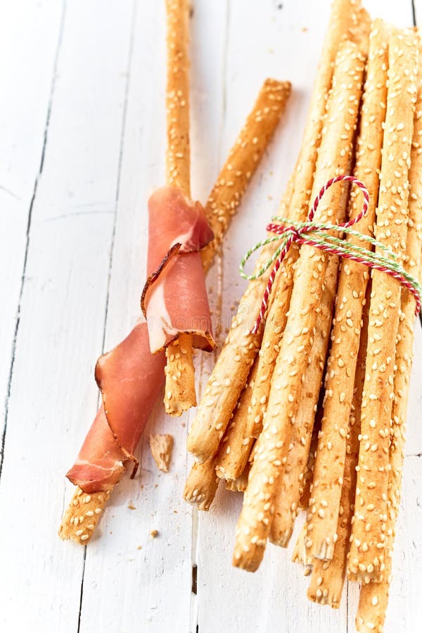Grissini Breadsticks Wrapped in Parma Ham Stock Photo - Image of seeds ...