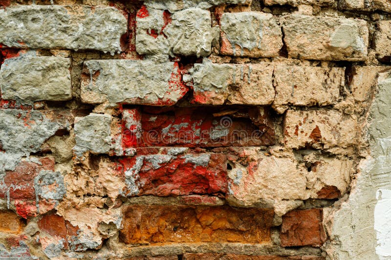 Weathered Brick Wall Showcasing a Rich Palette of Colors and Textures ...