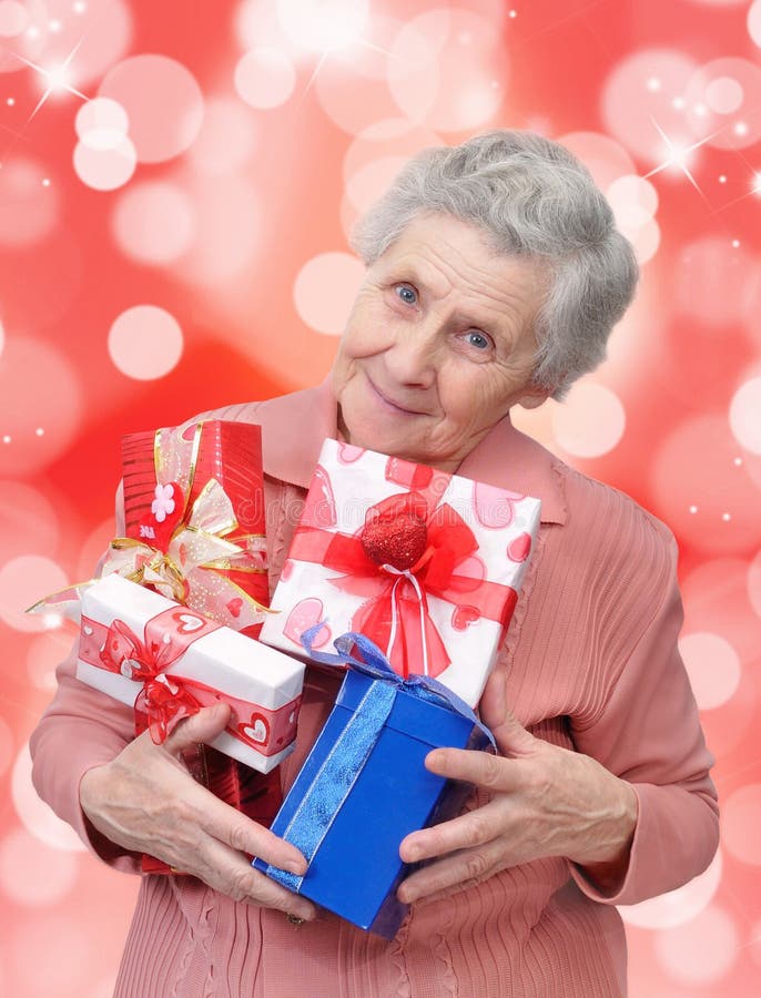 Großmutter mit Geschenken stockbild. Bild von verbunden - 36025459