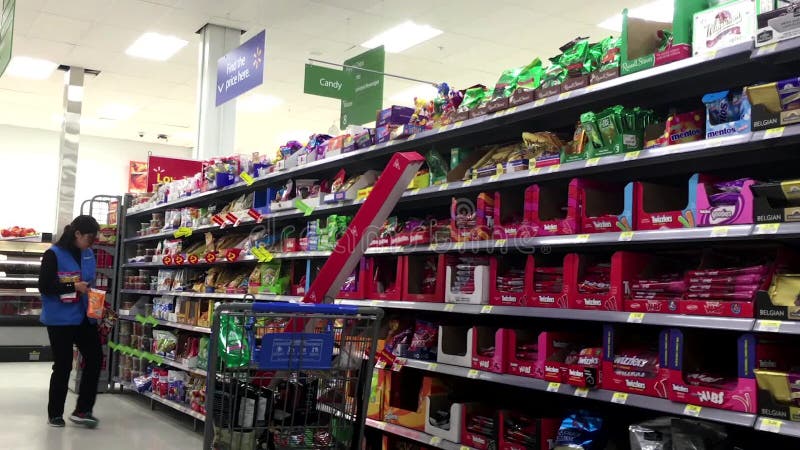 Grocery Clerk Stocking Drink Stock Footage - Video of coca, mall: 74390540