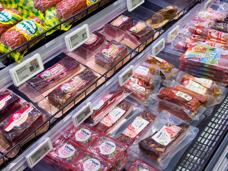 Grocery Store Meat Section with Various Packaged Pork and Beef Products ...