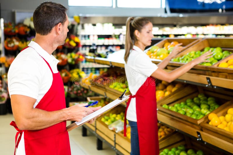Grocery Store Staff with Clipboard Stock Image - Image of fruit ...