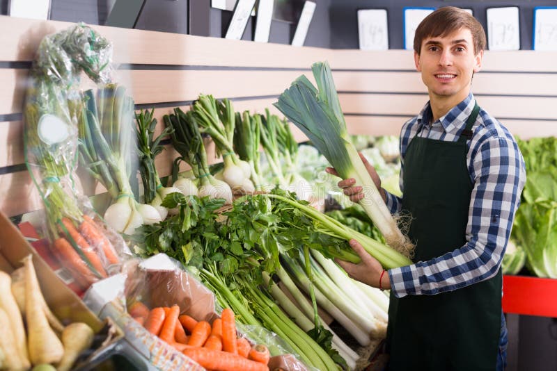 Grocery Worker Selling Vegetables Stock Image - Image of seasonal ...