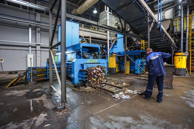 GRODNO, BELARUS - OCTOBER 2018: Worker Near Garbage Press on Modern ...