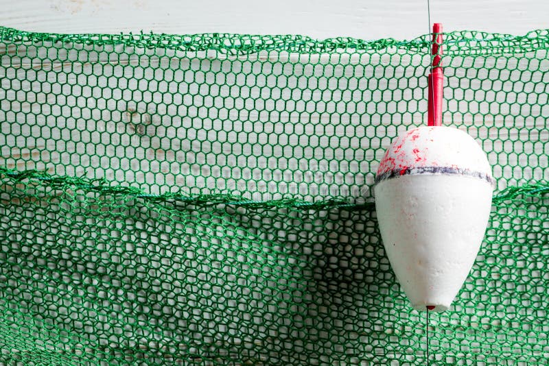 Groen visnet met vlotters stock afbeelding. Image of gaas - 35191289
