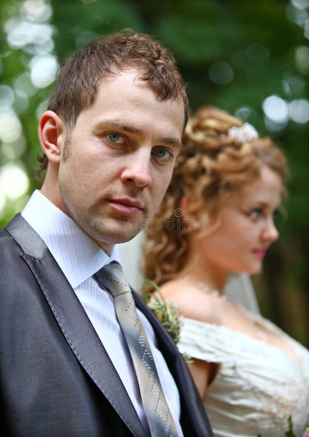 Bride and Groom Flying on Umbrella Stock Image - Image of love, green ...