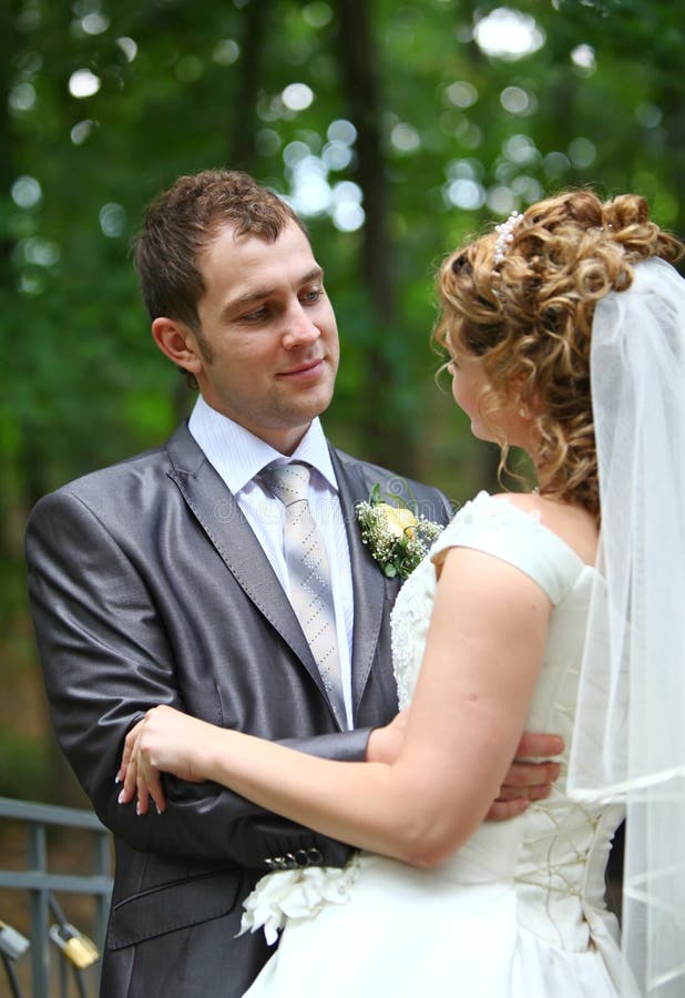 Bride and Groom Flying on Umbrella Stock Image - Image of love, green ...