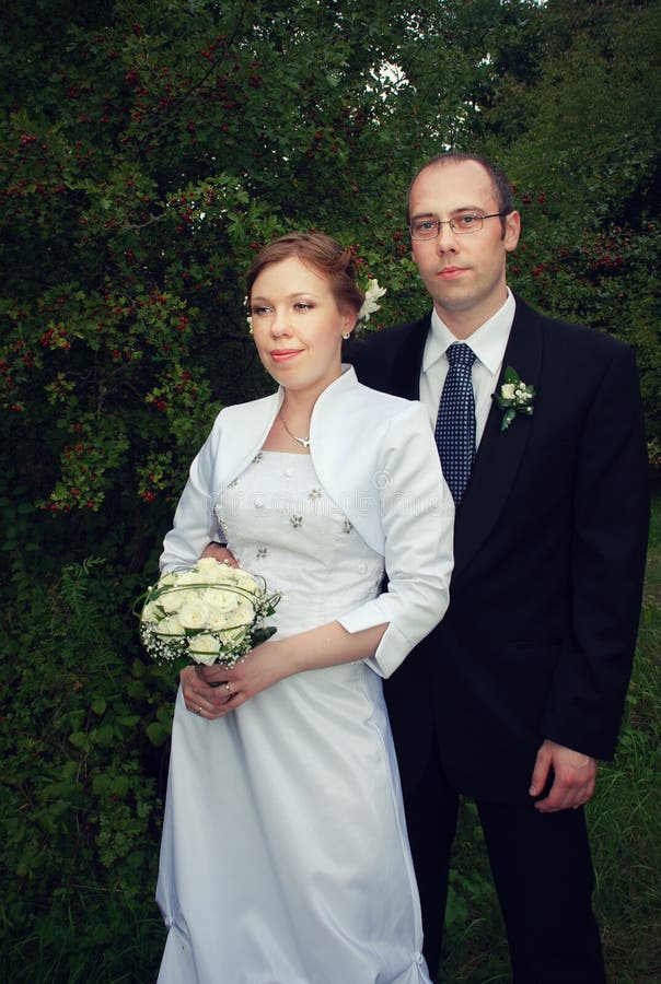 Groom and bride stock image. Image of hands, flowers - 28848587
