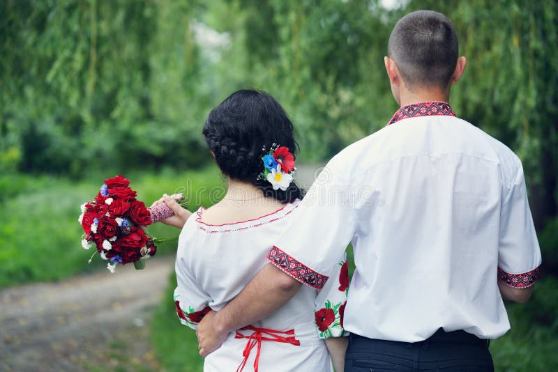 Groom and bride, back view stock photo. Image of flowers - 72553276
