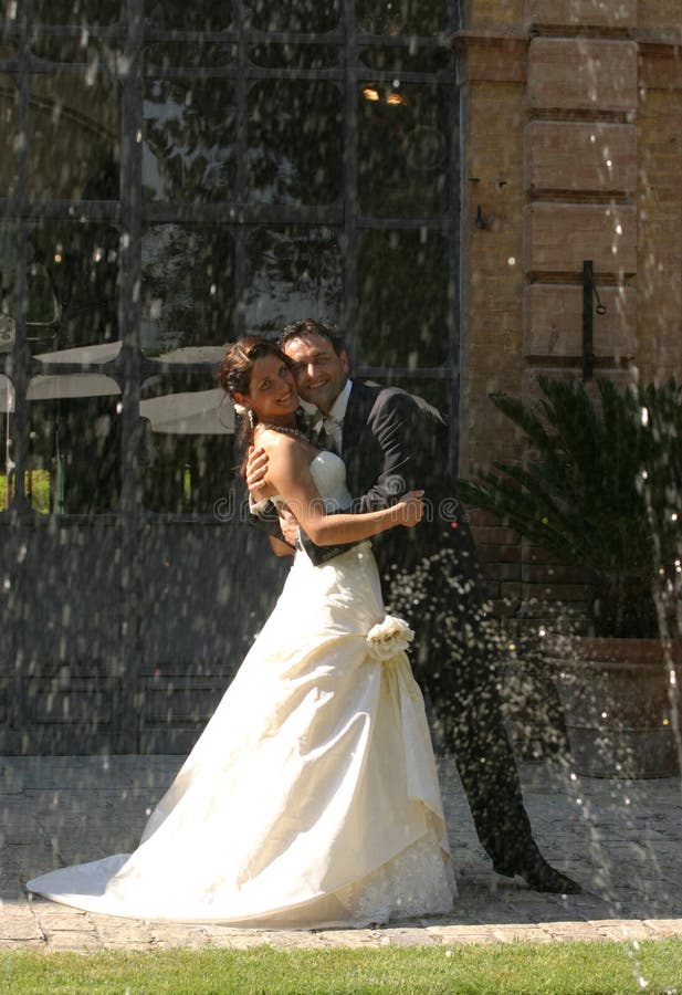 Groom and bride embrace stock photo. Image of ladies, lifestyle - 7011888