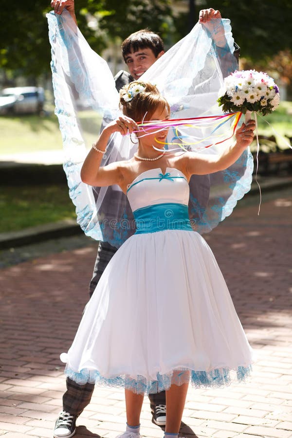 Groom and Bride Make Some Fun Stock Image - Image of lantern, romantic ...