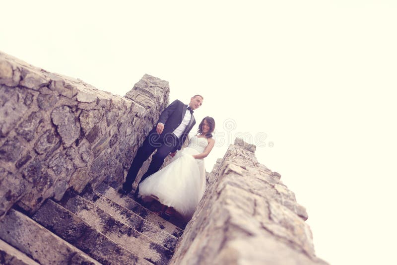 Groom and bride outdoors stock photo. Image of dress - 57223826