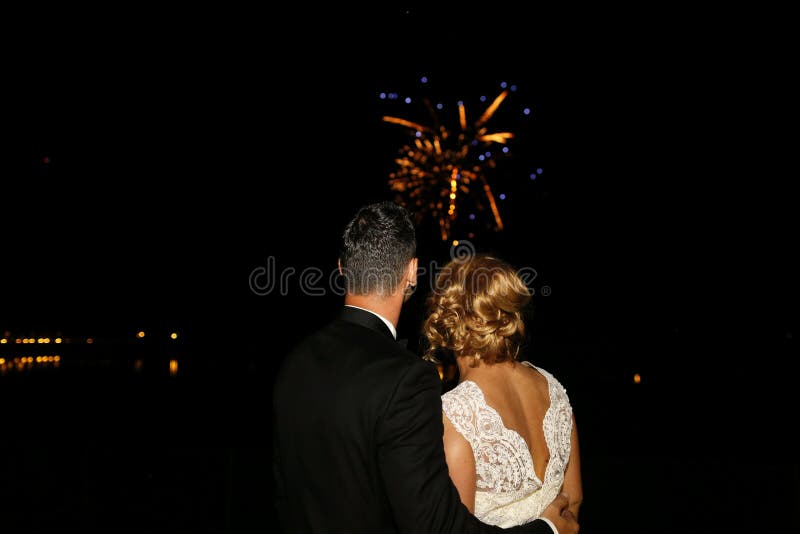 Young Couple Watching The Fireworks Stock Image - Image of beautiful ...