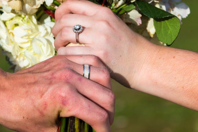 Groom and Bride Wedding Rings Stock Photo - Image of side, rings: 81626298
