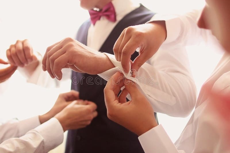 Groom Gets Corsage stock image. Image of care, ties, romantic - 44585