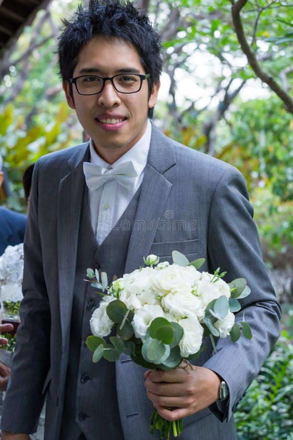 Groom Holding Beautiful White Rose Stock Photo - Image of marriage ...